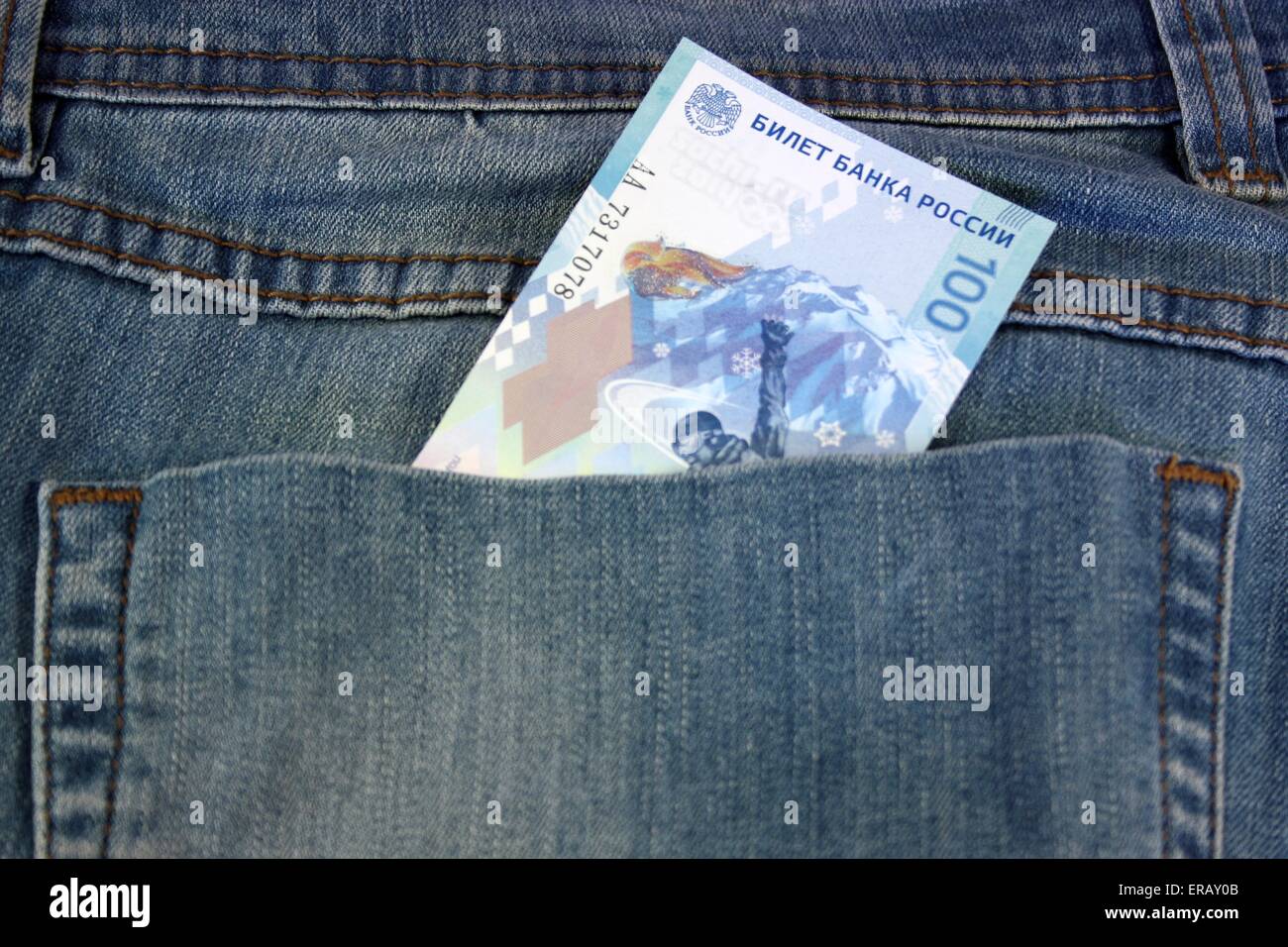 One hundred new Olympic rubles in his pocket, Issue 2014 Stock Photo ...