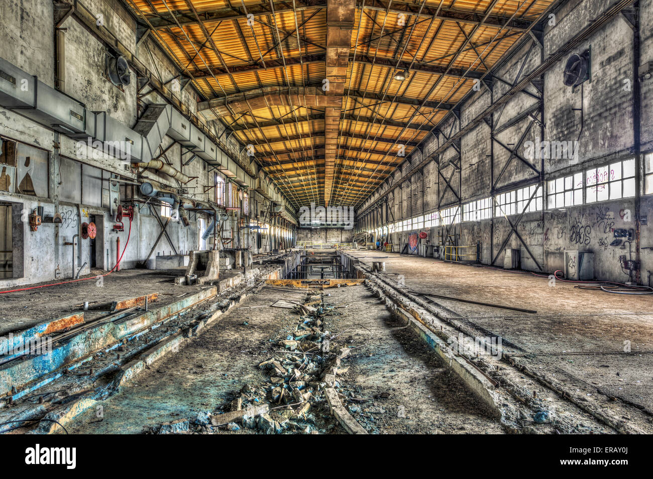 Decaying industrial hall in an abandoned factory Stock Photo - Alamy