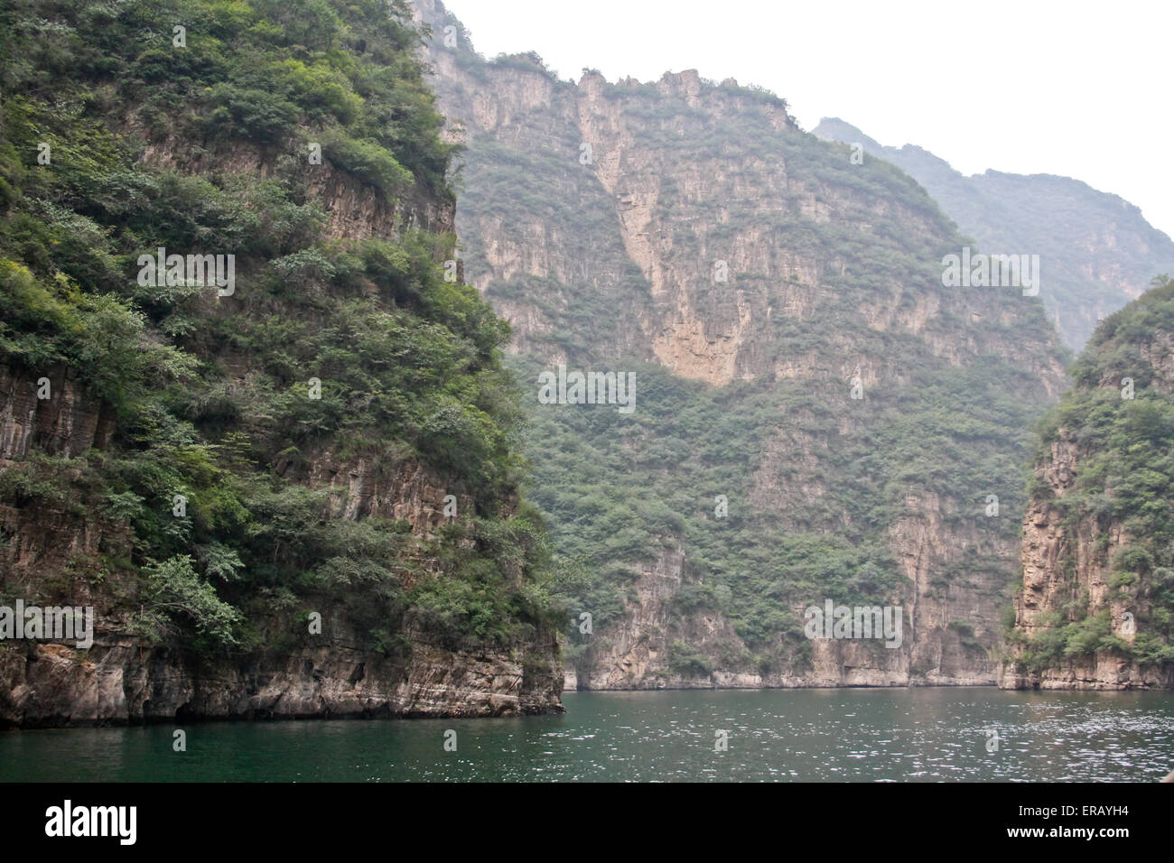 Steep high cliffs and the river at the bottom of the gorge Stock Photo ...