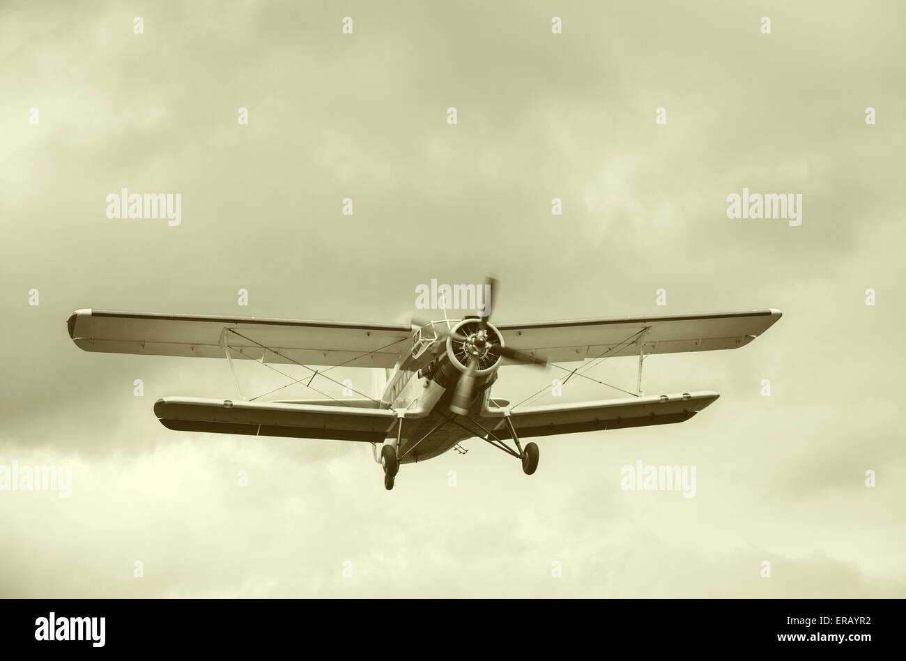 Old retro plane flies in the sky Stock Photo - Alamy