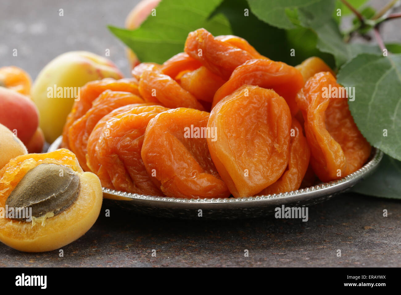 Natural organic dried apricots, rustic still life Stock Photo - Alamy