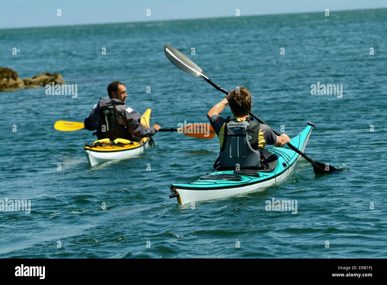 Sea kayaking off the coast of Anglesey, Wales, UK Stock Photo - Alamy