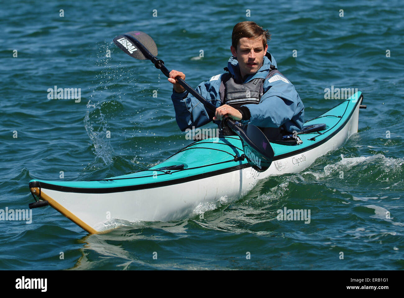 Sea kayaking off the coast of Anglesey, Wales, UK Stock Photo - Alamy