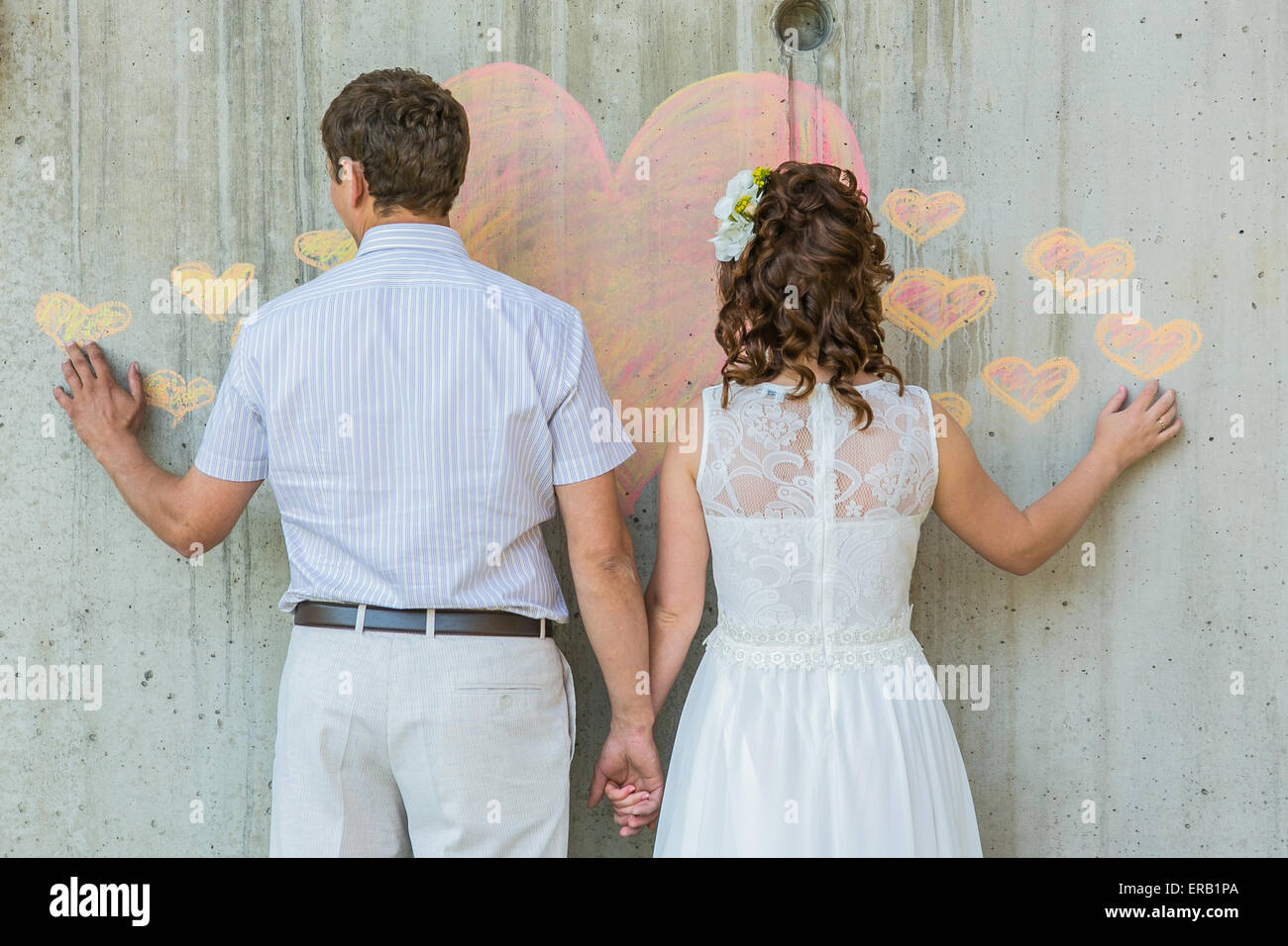 Grooms arm hi-res stock photography and images - Alamy