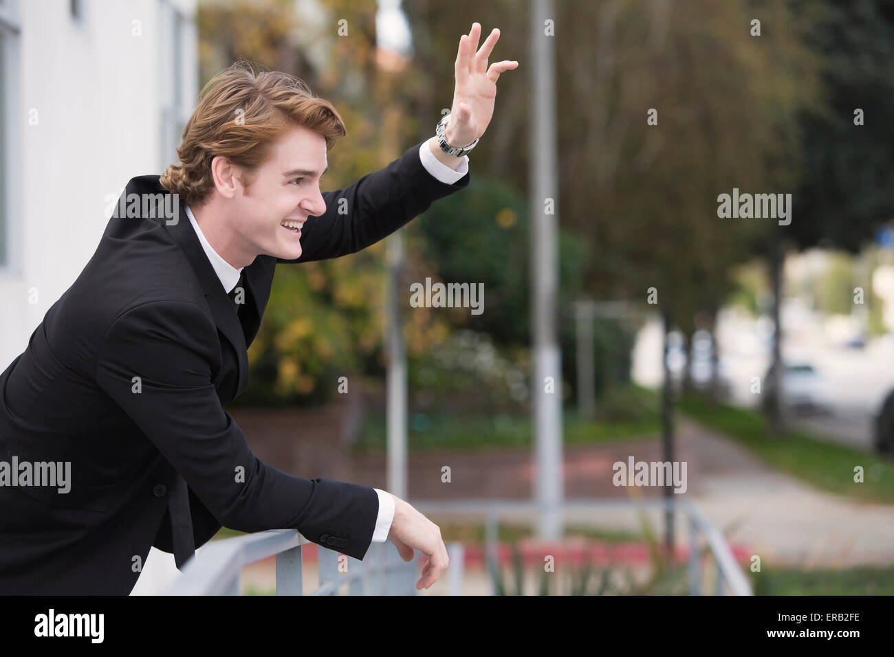 Adult man in suit greeting hi-res stock photography and images - Alamy