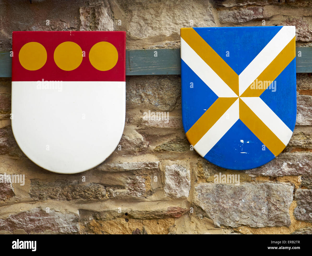 Medieval coats of arms on shield shaped plaques - these are of two of ...