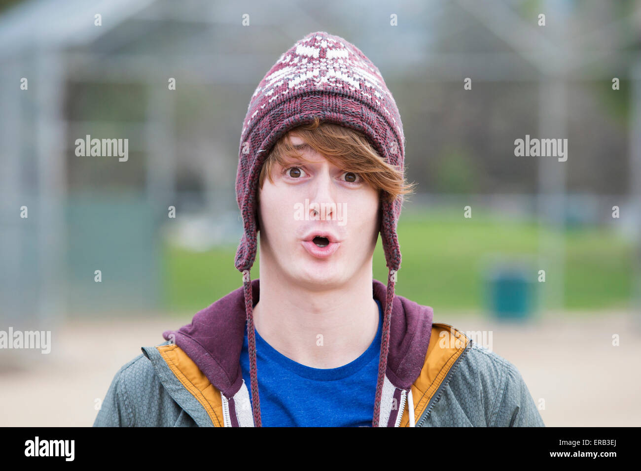 portrait of a smiling handsome man in a hat Stock Photo - Alamy