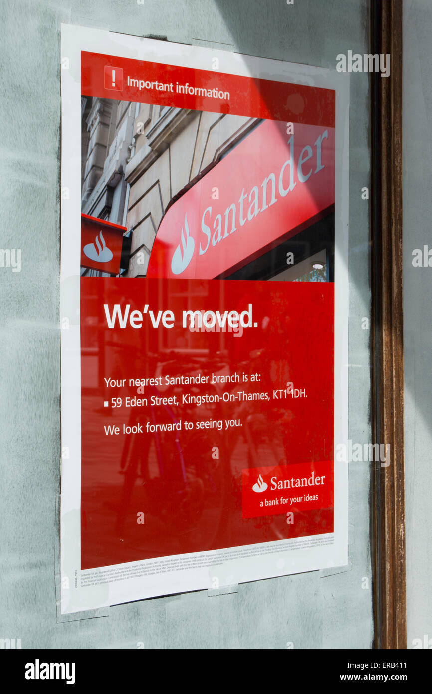 poster on white washed window of a former santander bank branch giving ...