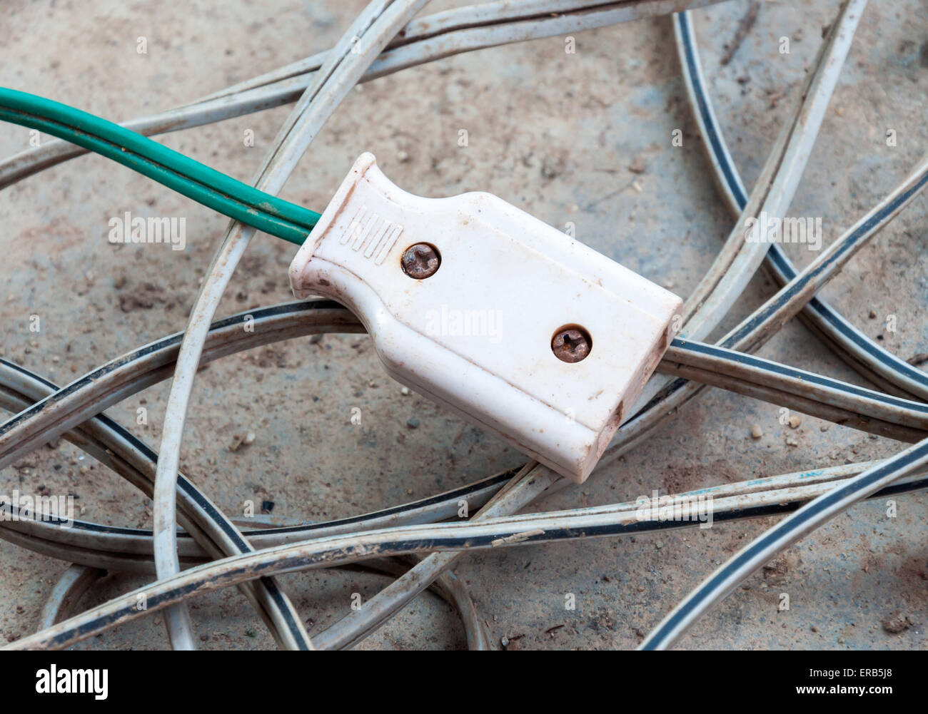 Dirty plug socket on the complex electric wire Stock Photo - Alamy