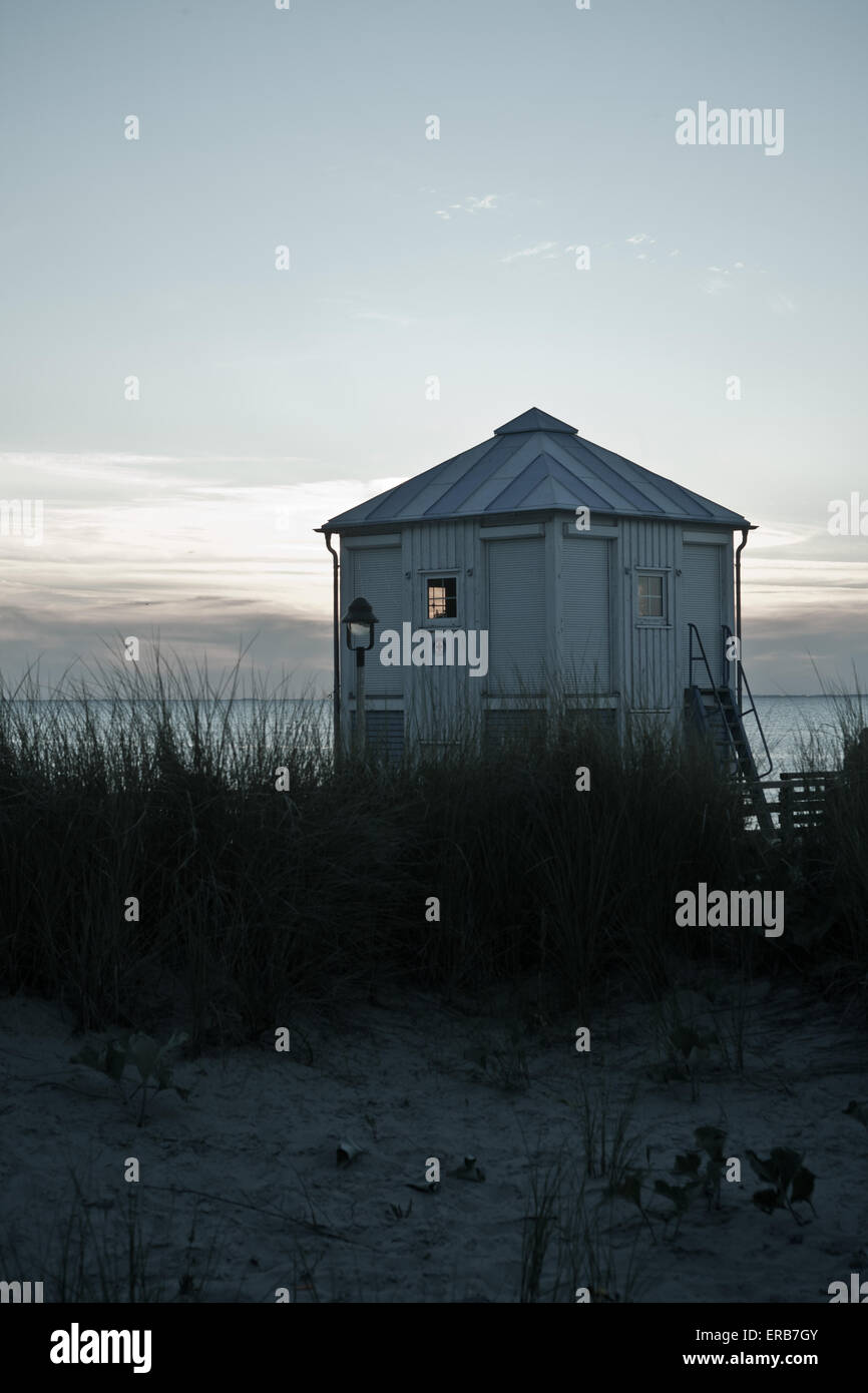 Beach building at sunset Stock Photo - Alamy
