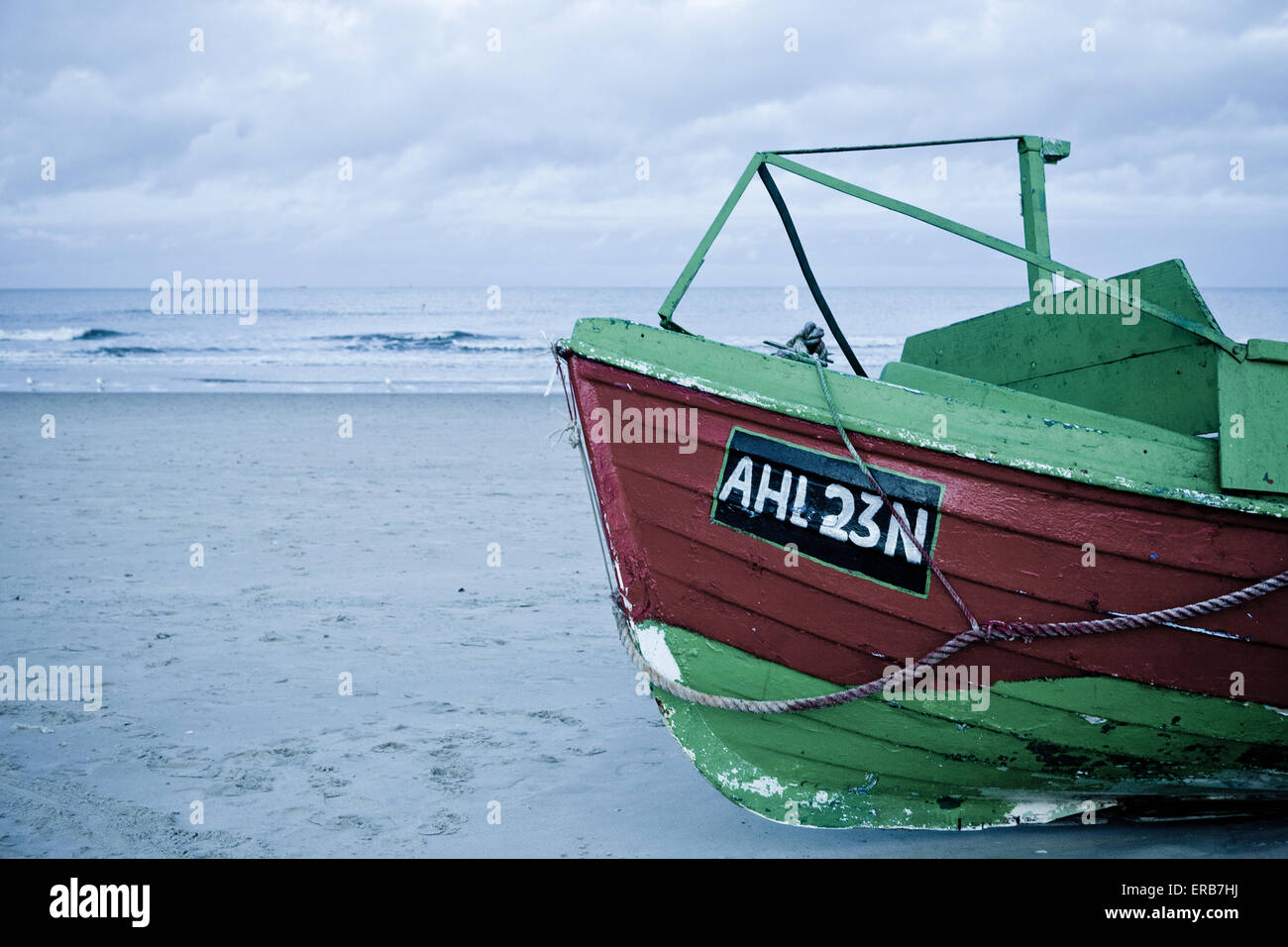 Old fishing boat on the beach Stock Photo - Alamy
