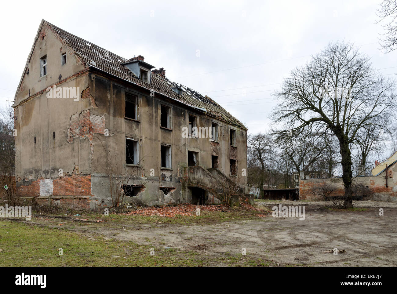 Old ruined building. Left collapsing house, the object falling into ...