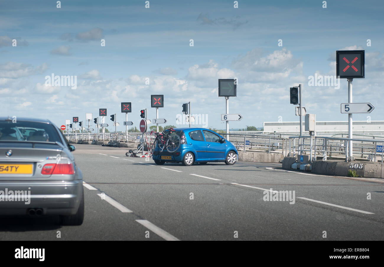 Cars getting ready to board a eurotunnel train at the Calais terminal ...