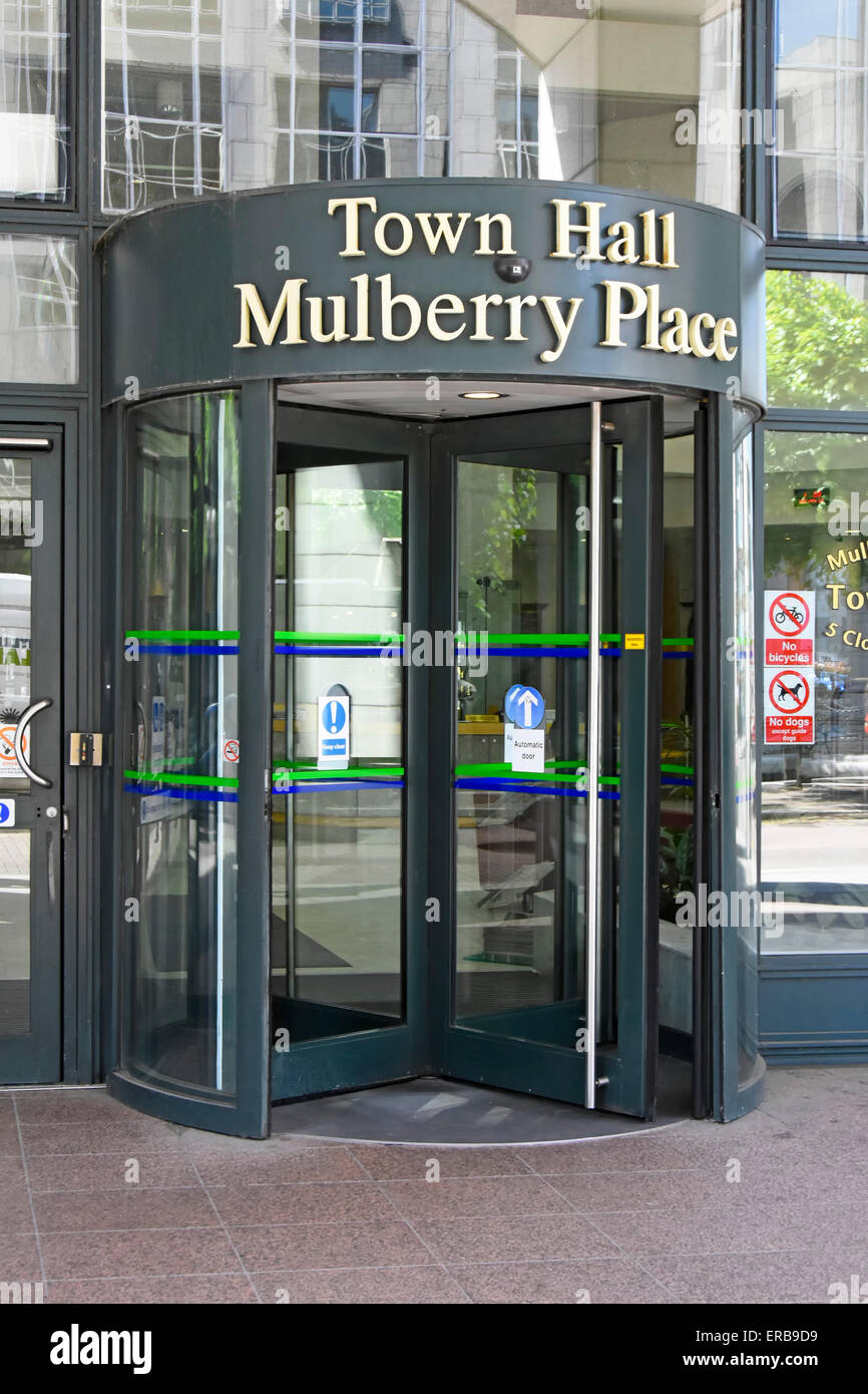 Sign above revolving door entrance to Tower Hamlets Town Hall Mulberry ...