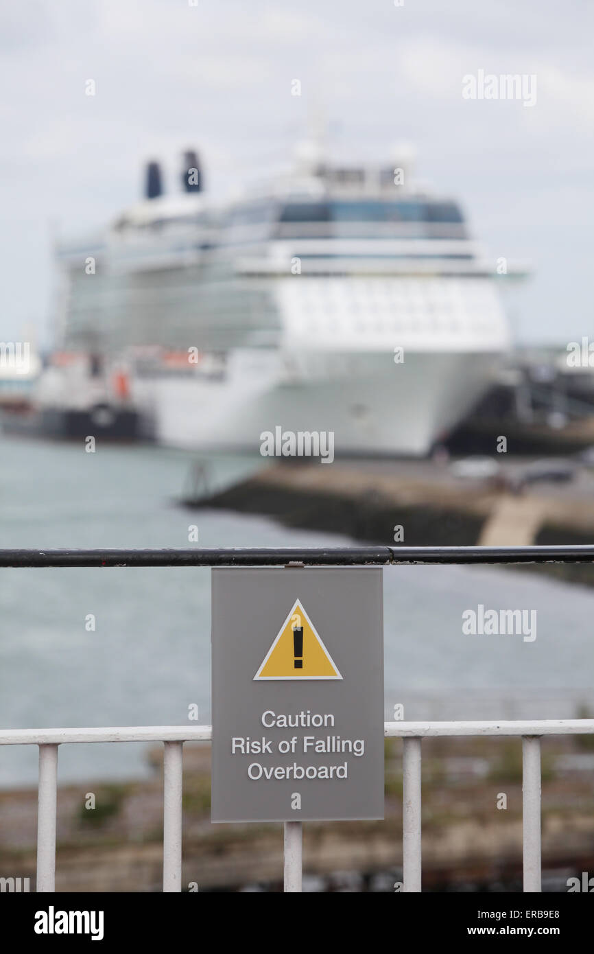 Caution risk of falling overboard sign on the red Funnel Ferry with ...