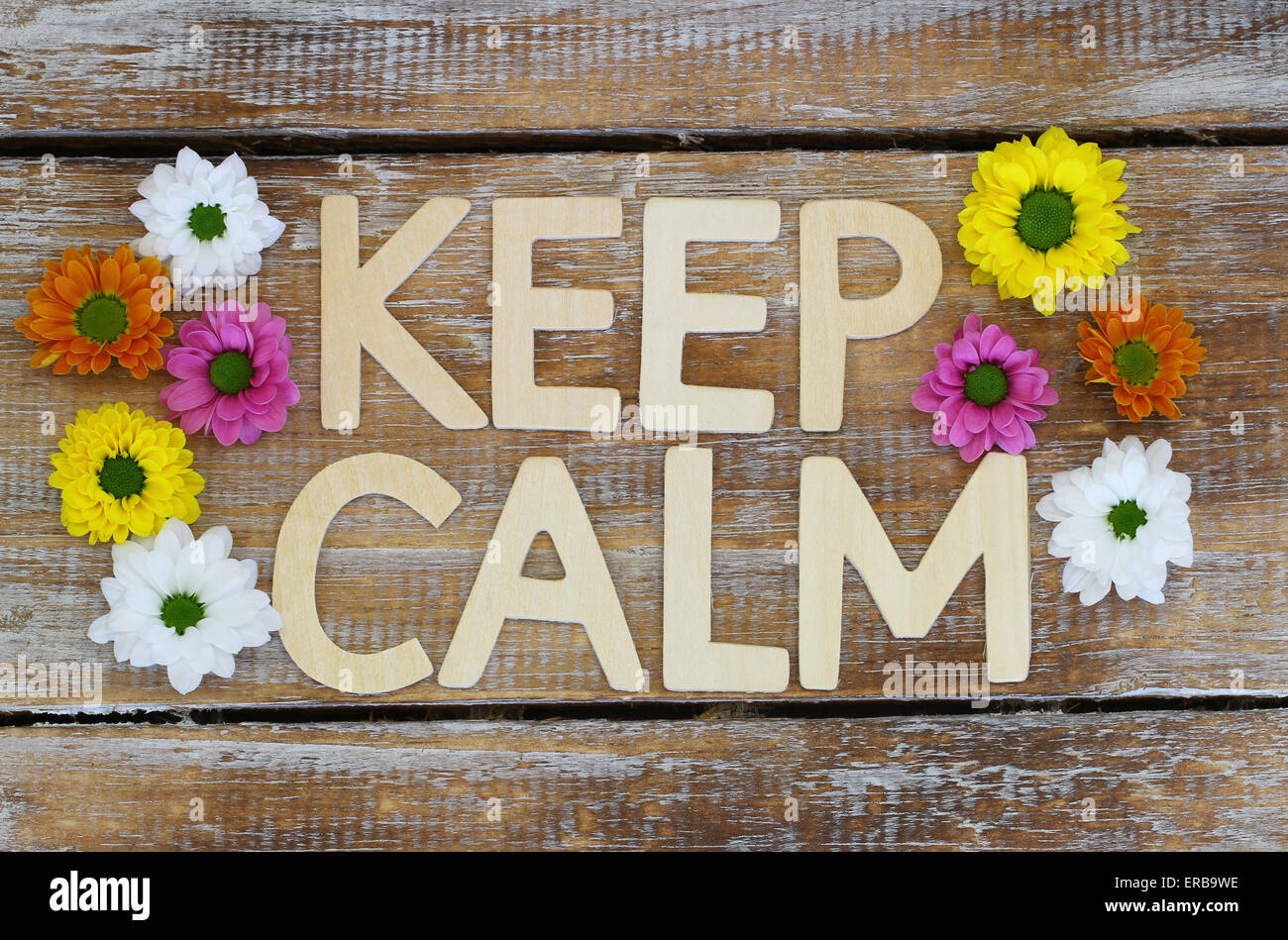 Keep calm written with wooden letters and Santini flowers Stock Photo ...