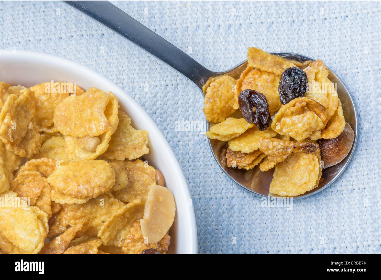 Mix cereal, corn flakes on a spoon Stock Photo - Alamy