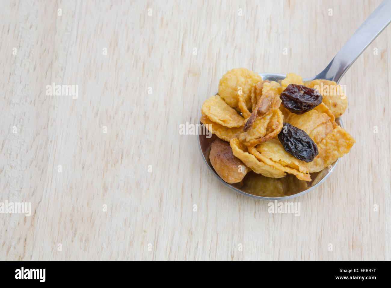 Mix cereal, corn flakes on a spoon Stock Photo - Alamy