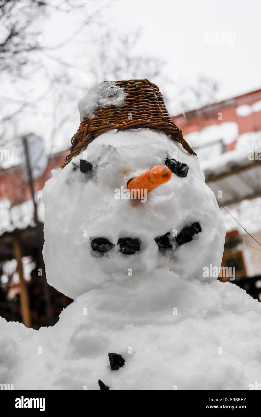 Snowman with shovel hi-res stock photography and images - Alamy