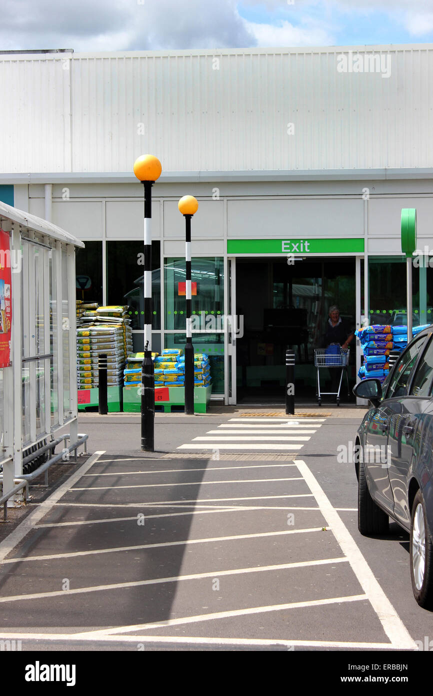Supermarket exit on zebra-crossing Stock Photo - Alamy