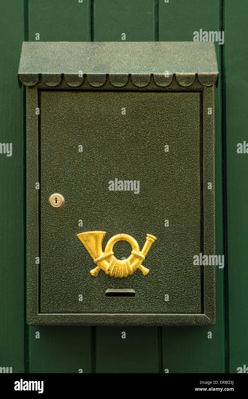 Green mail box on the wall Stock Photo - Alamy