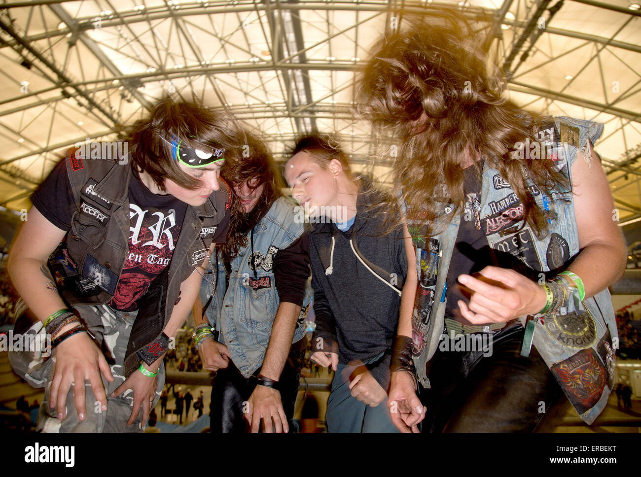 Gelsenkirchen, Germany. 31st May, 2015. Heavy metal fans perform a head ...