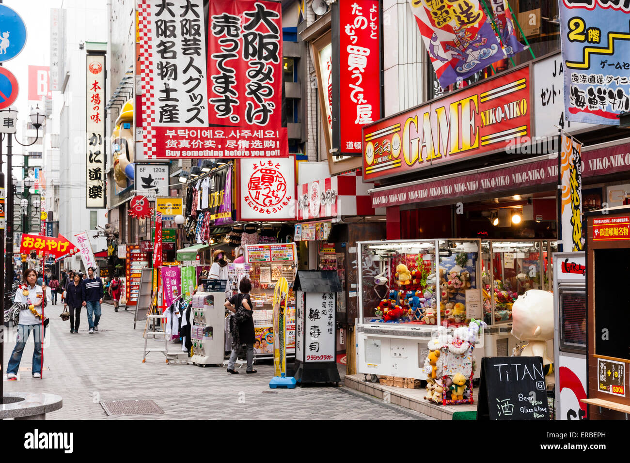 Japan, Osaka, Dotonbori. Street, shops and stores, many overhead Stock ...