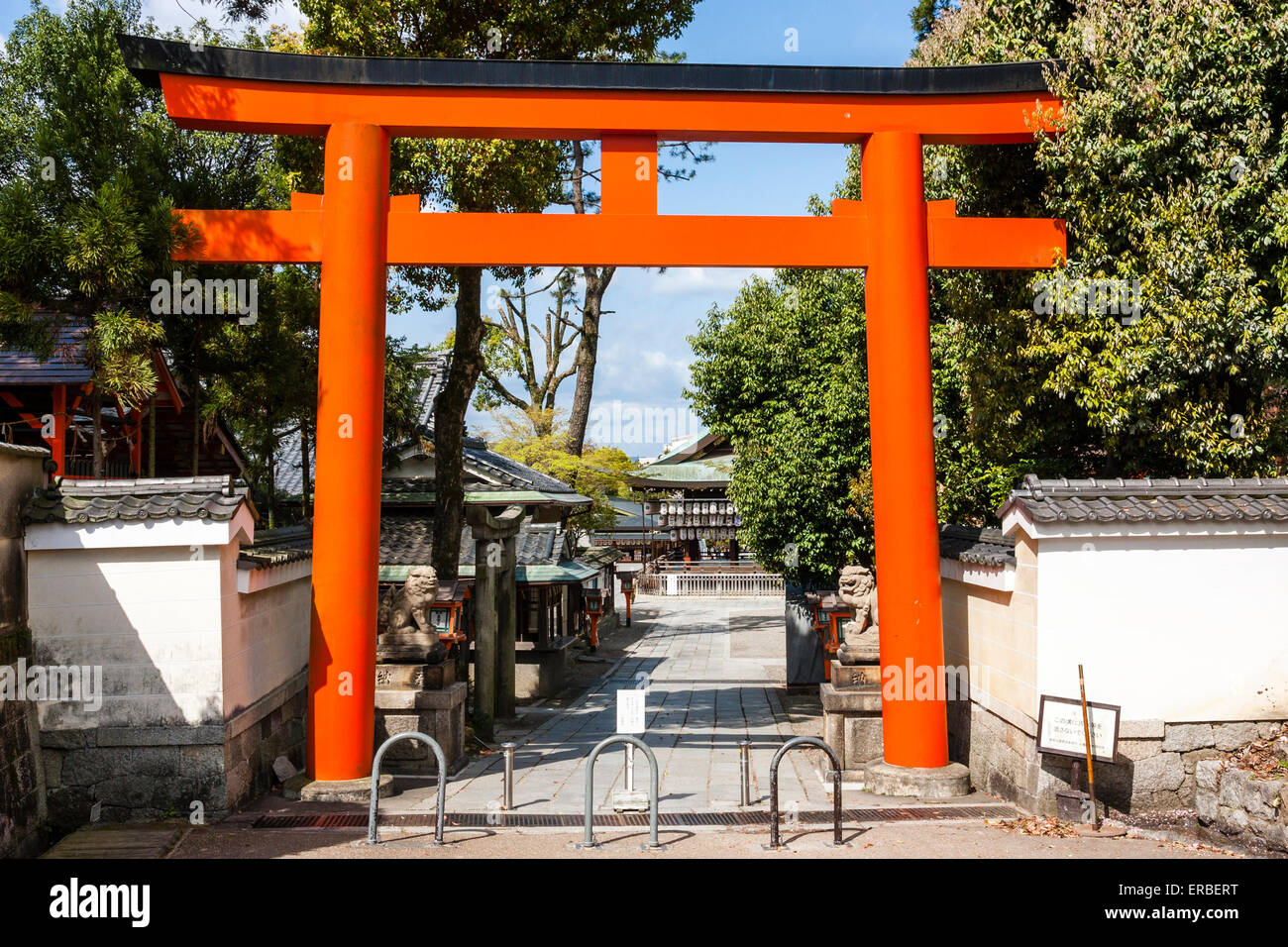 Orange myōjin type torii gate at the back entrance to the famous Shinto ...