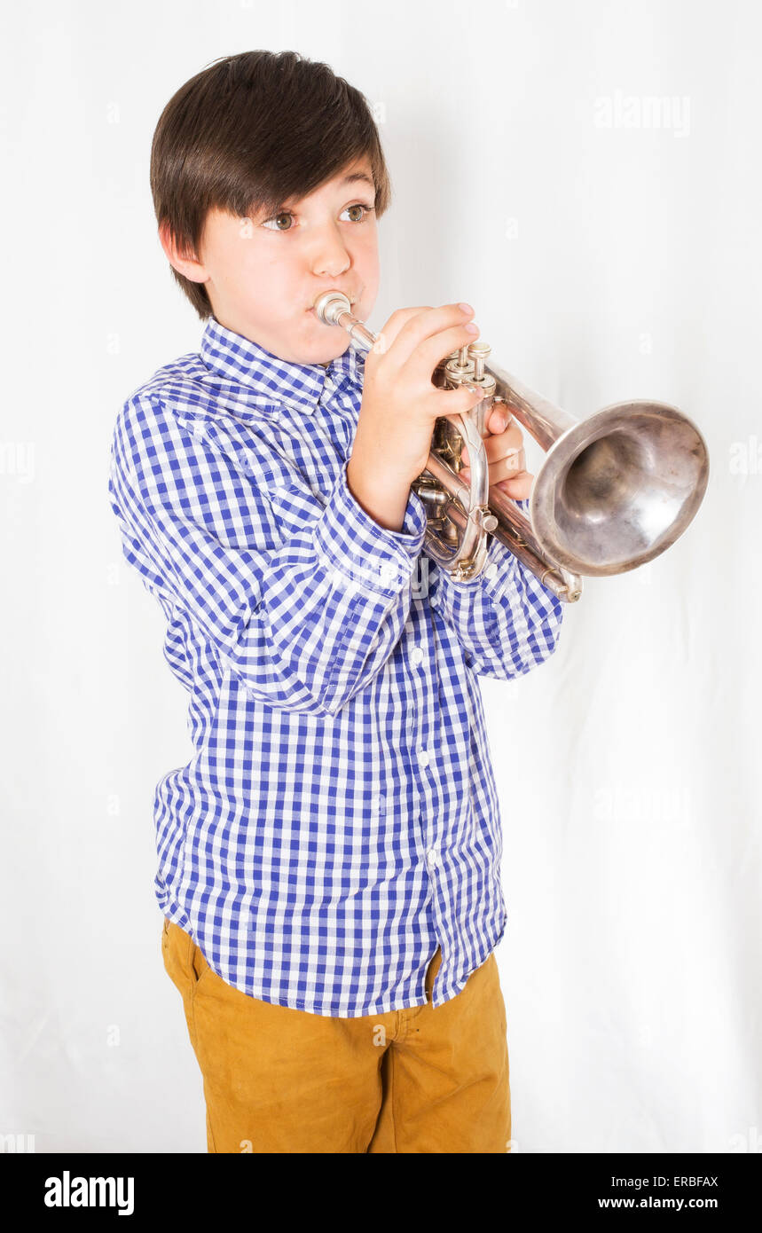 portrait of a boy playing the trumpet Stock Photo - Alamy