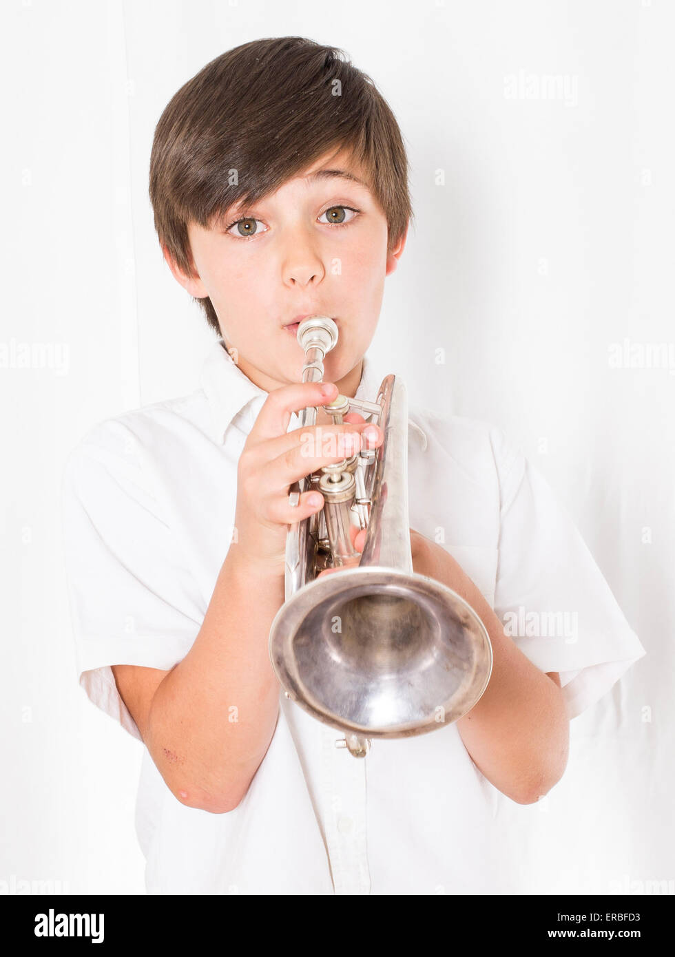 portrait of a boy playing the trumpet Stock Photo - Alamy