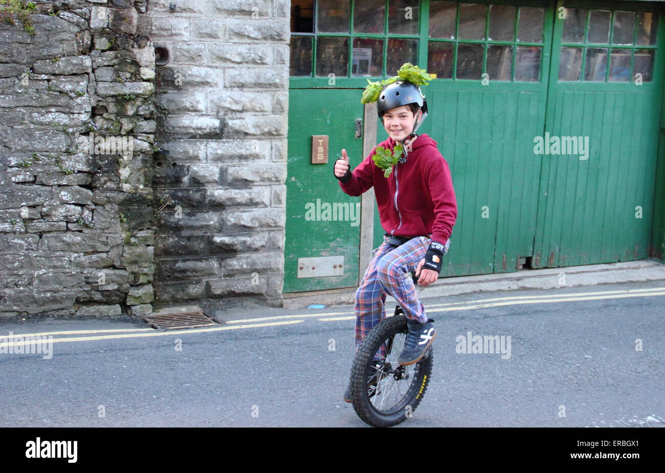 Boy unicycle hi-res stock photography and images - Alamy