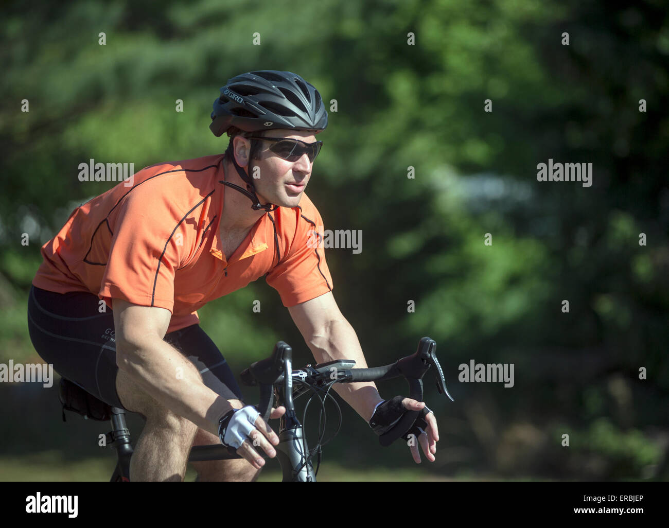 Riding bike on road hi-res stock photography and images - Alamy