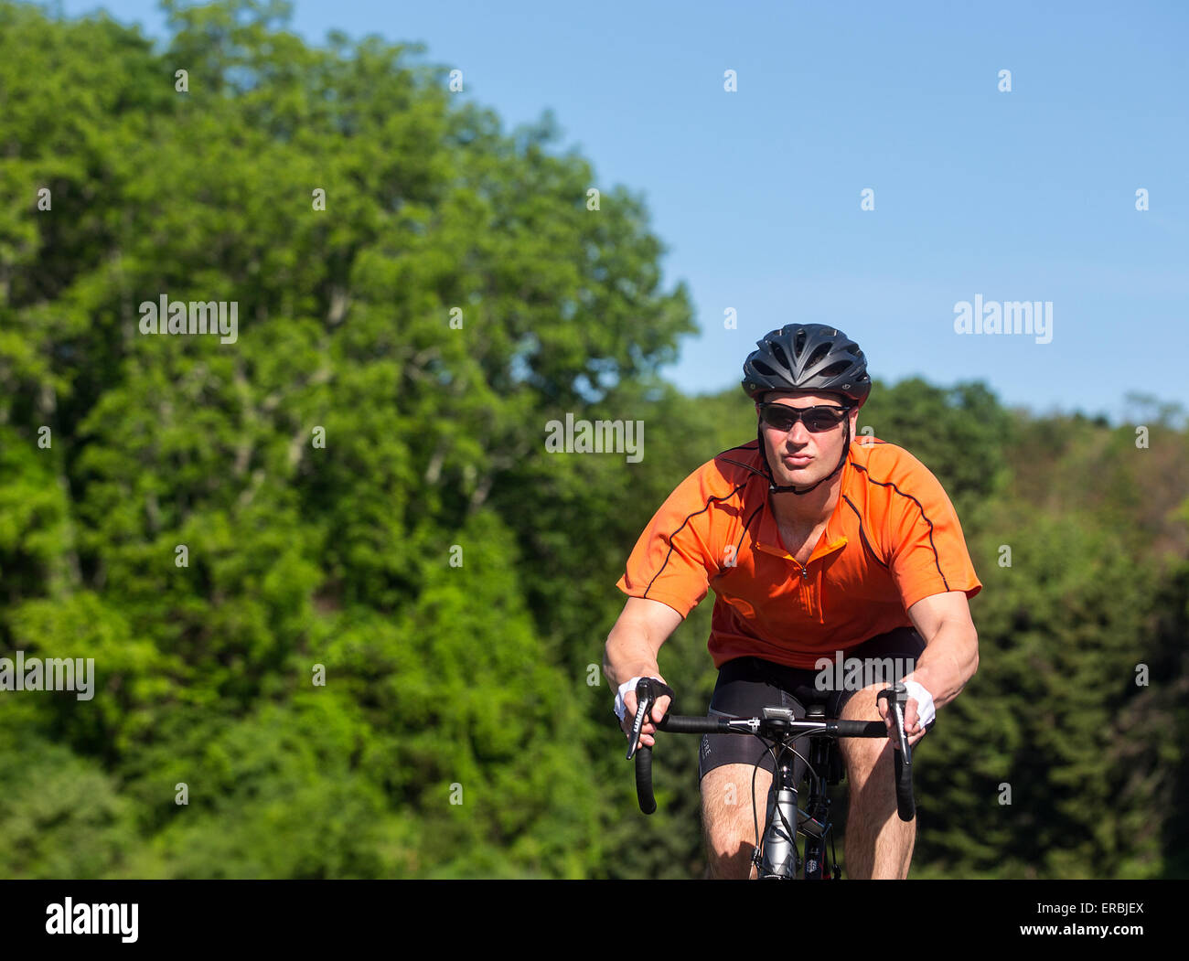 Man on road bike riding hi-res stock photography and images - Alamy