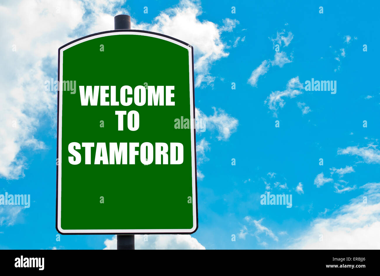 Green road sign with greeting message WELCOME TO STAMFORD, ENGLAND ...
