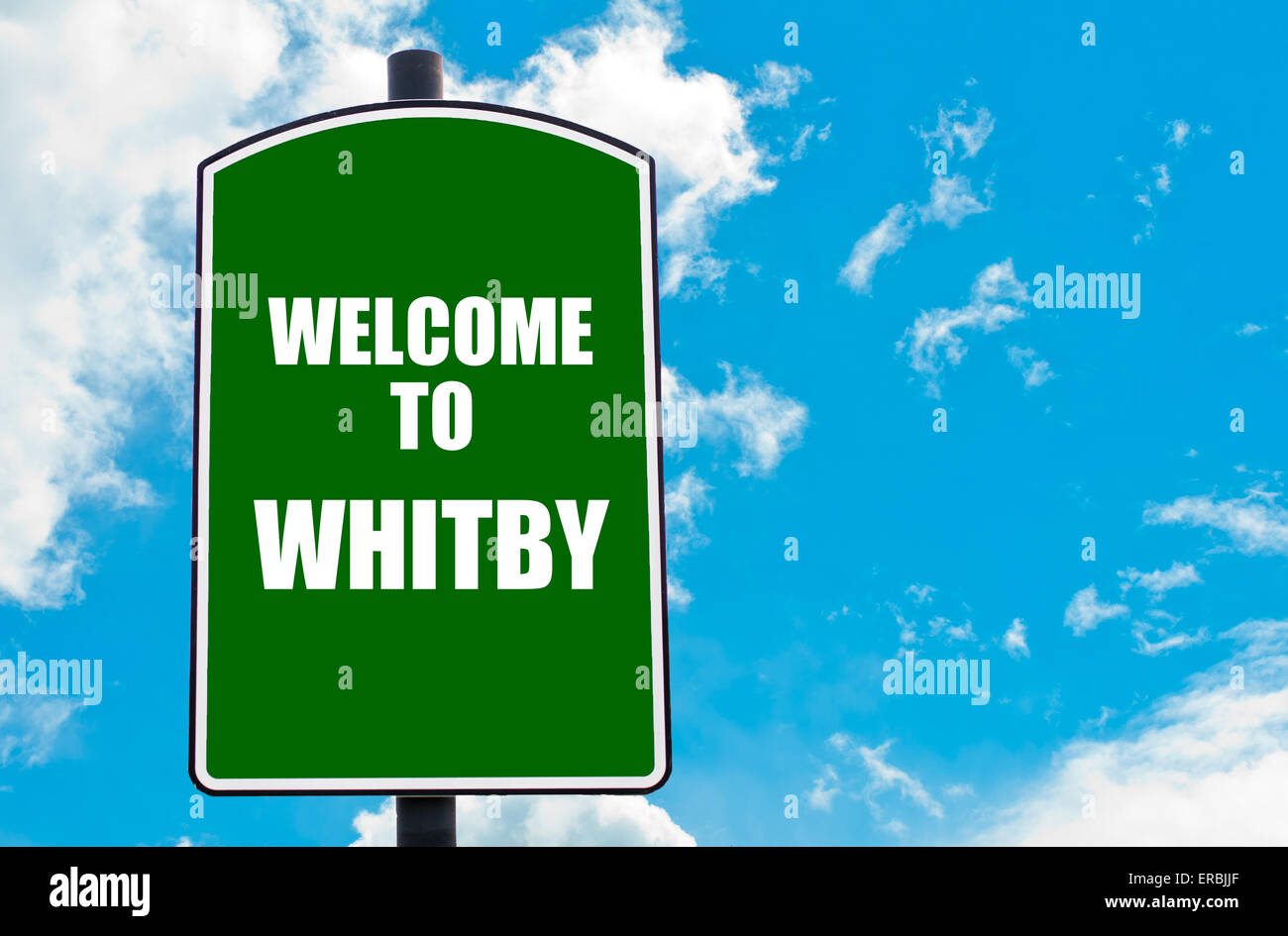 Green road sign with greeting message WELCOME TO WHITBY, ENGLAND ...