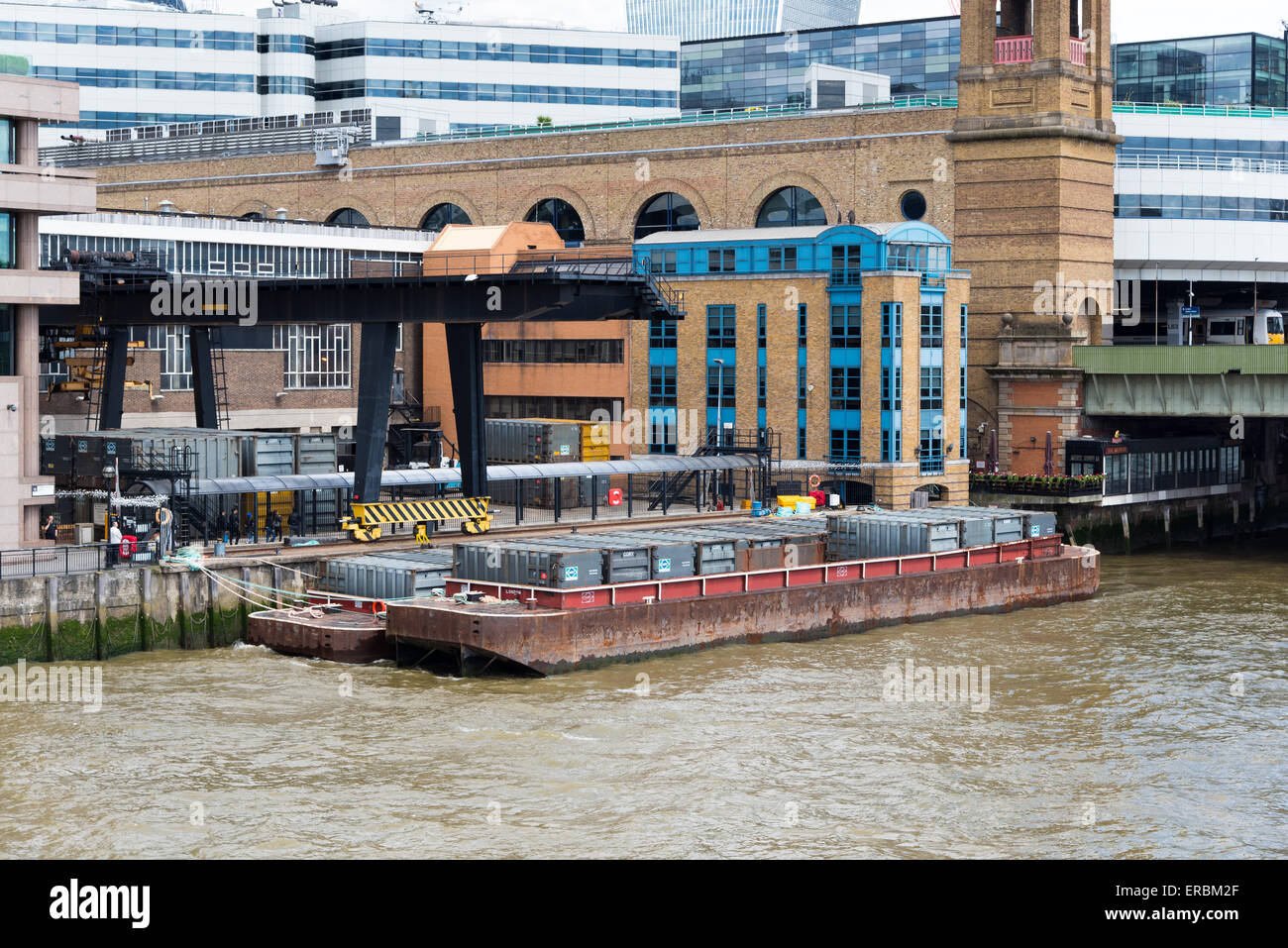 Waste disposal site next to Cannon Street Station, London. Waste is ...