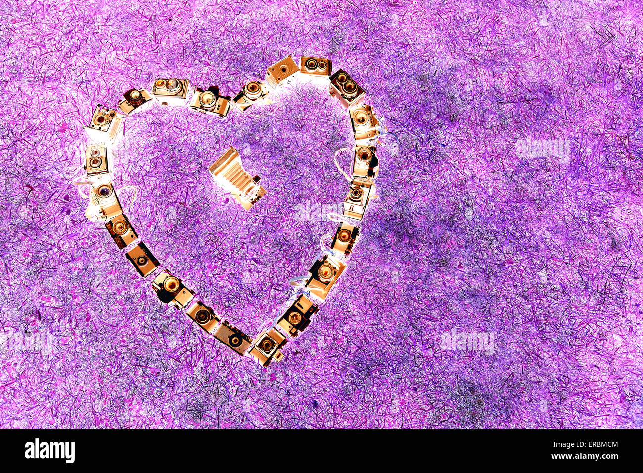Heart shape made by collection of old vintage retro film cameras, lying ...
