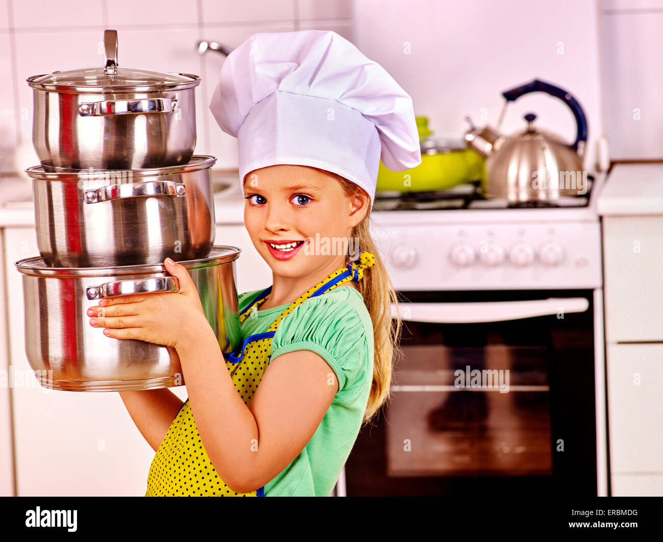 Child cooking at kitchen Stock Photo - Alamy