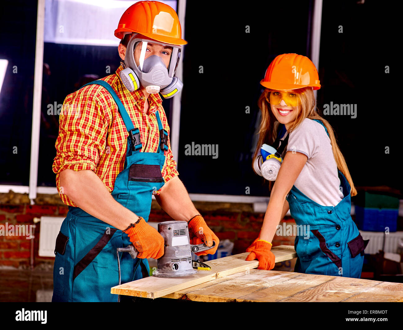 People in builder helmet Stock Photo - Alamy