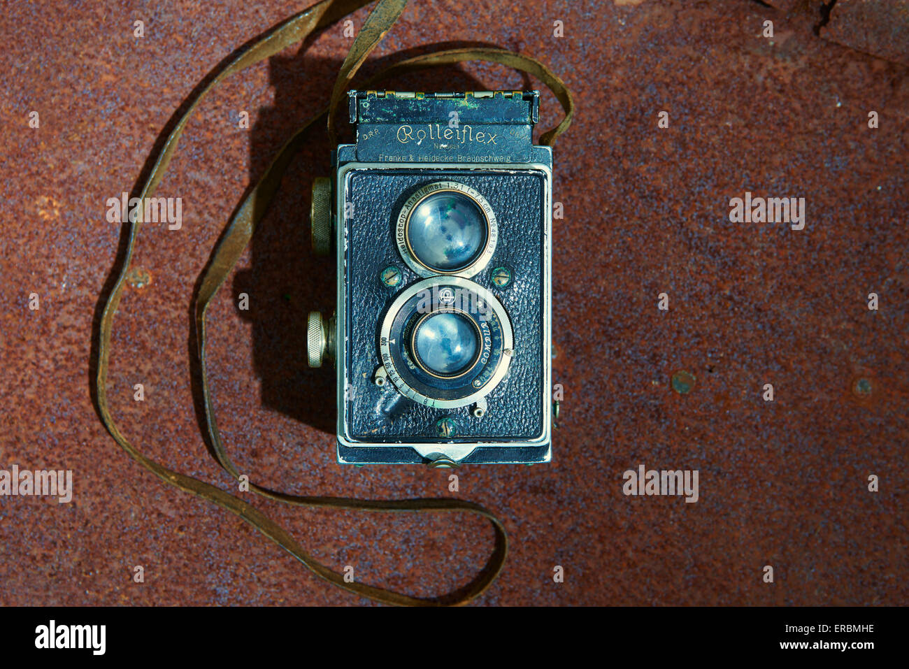 Vintage old retro film camera on rusty metal desk background. Nostalgic ...