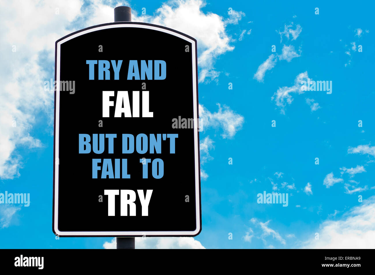 TRY AND FAIL BUT DO NOT FAIL TO TRY written on road sign isolated over ...