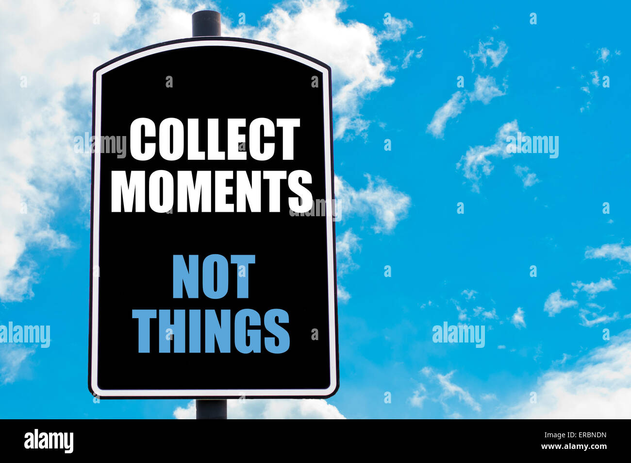 COLLECT MOMENTS NOT THINGS motivational quote written on road sign ...