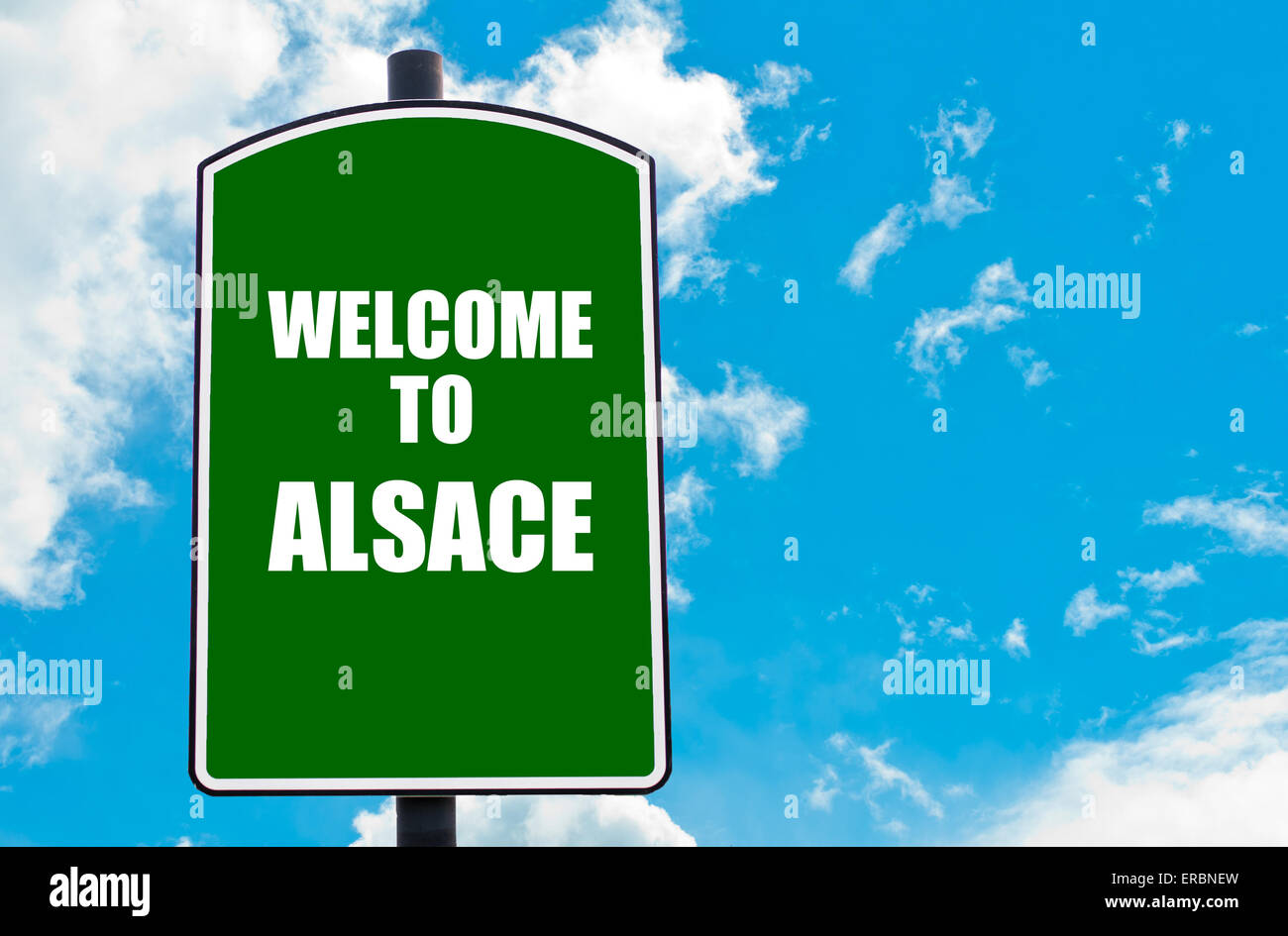 Green road sign with greeting message WELCOME TO ALSACE, isolated over ...