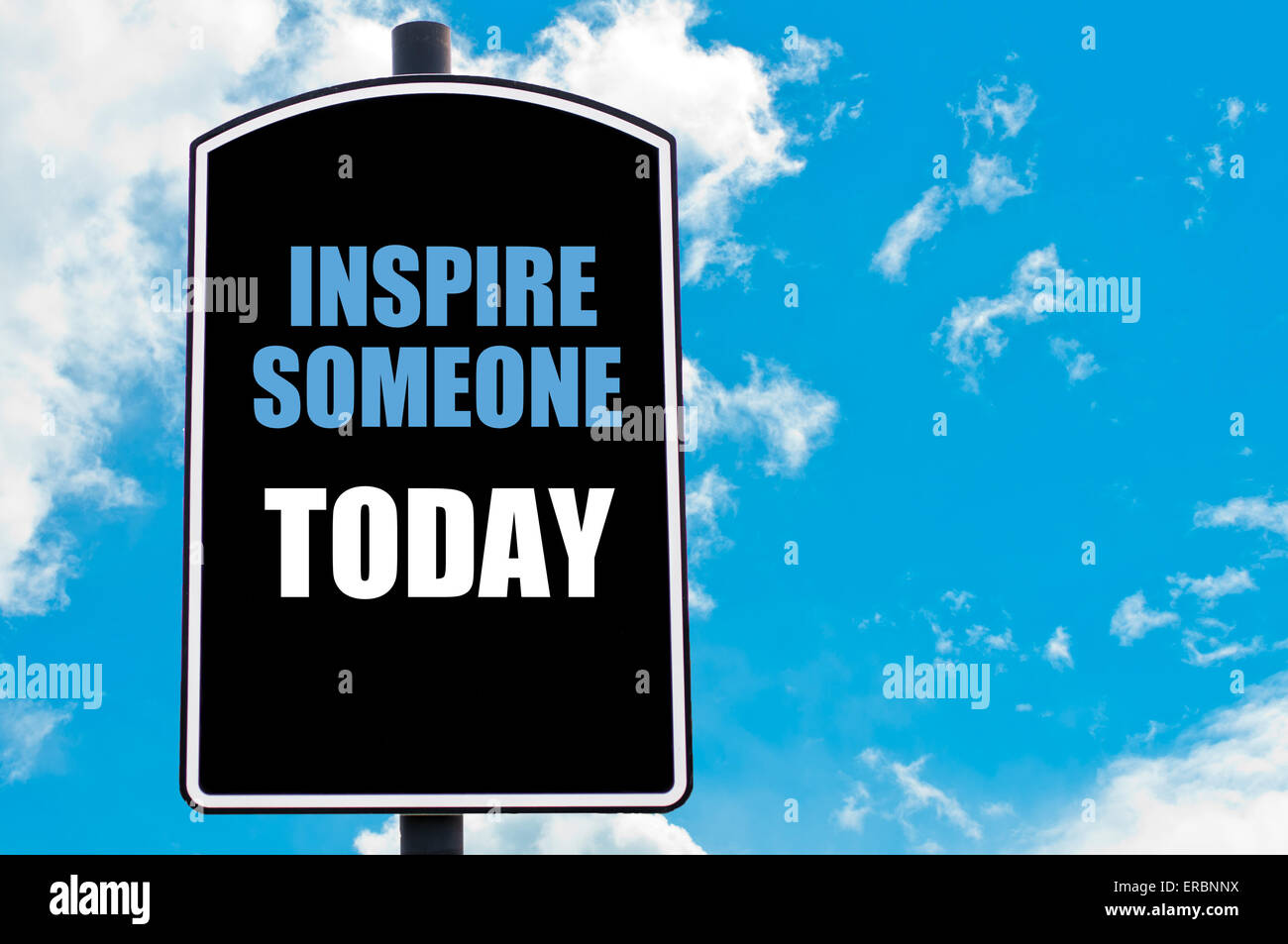 INSPIRE SOMEONE TODAY motivational quote written on road sign isolated ...