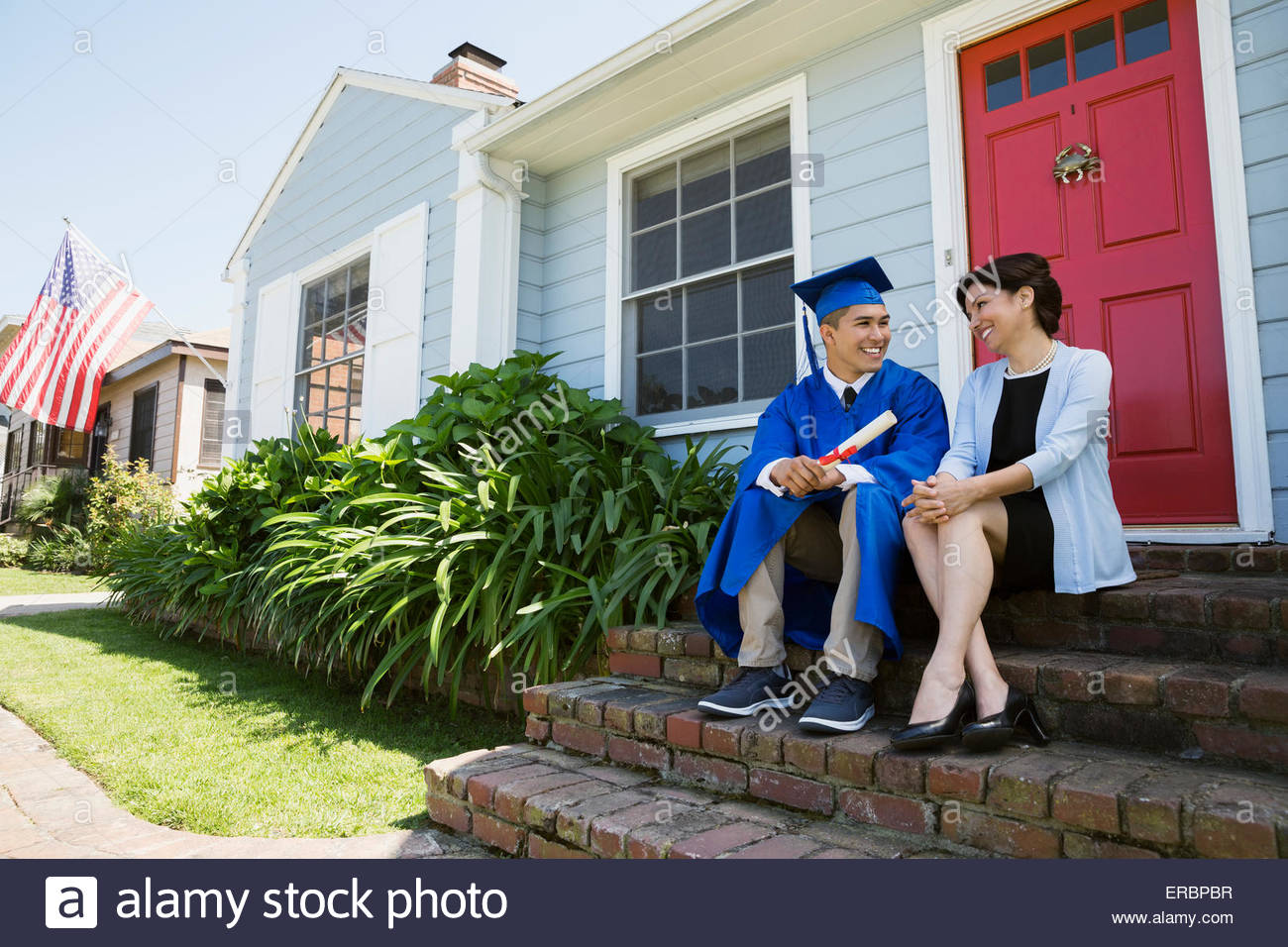 Happy graduate student diploma sitting hi-res stock photography and ...