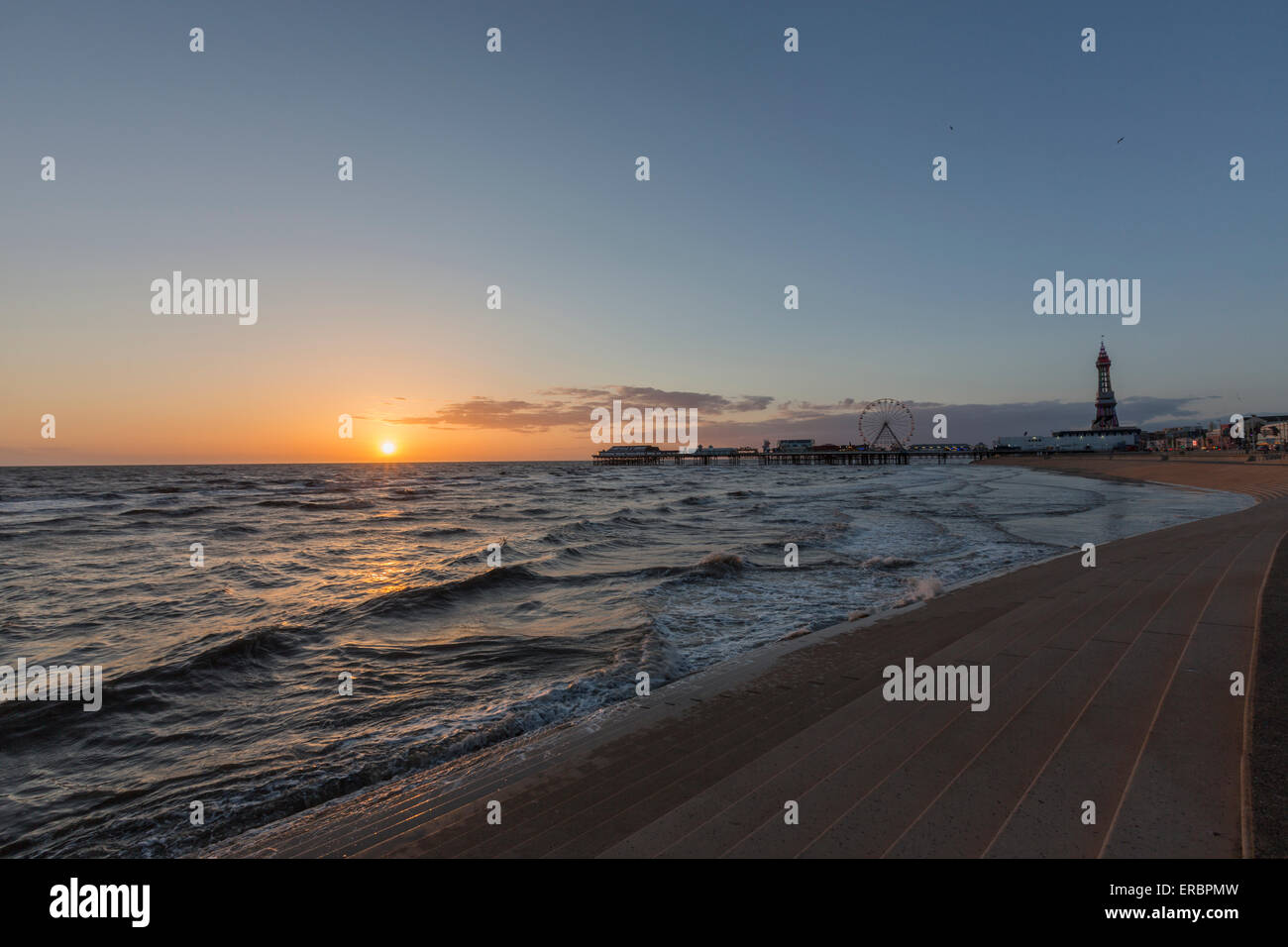 Blackpool beach and promenade at sunset Stock Photo - Alamy