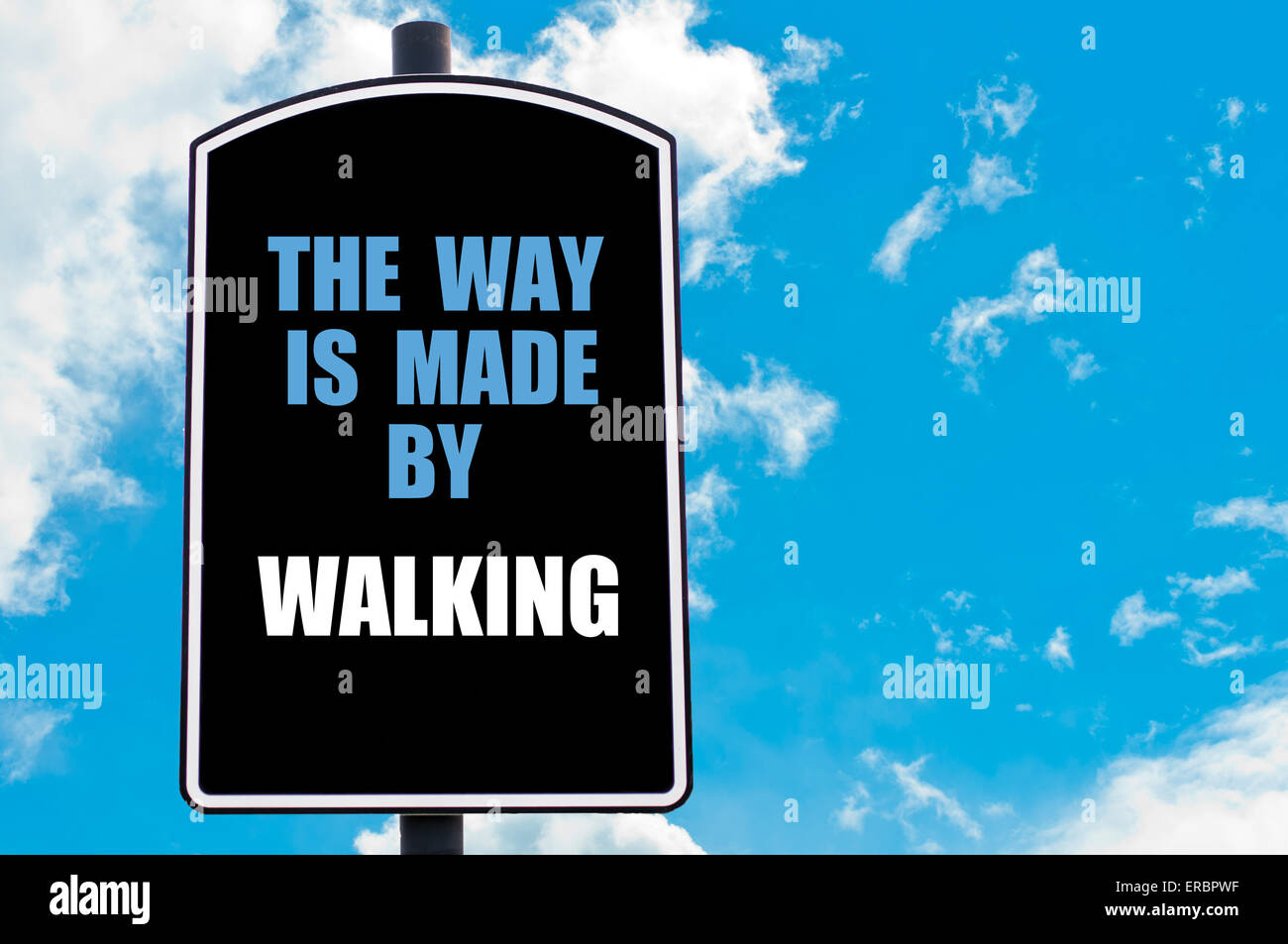 THE WAY IS MADE BY WALKING motivational quote written on road sign ...