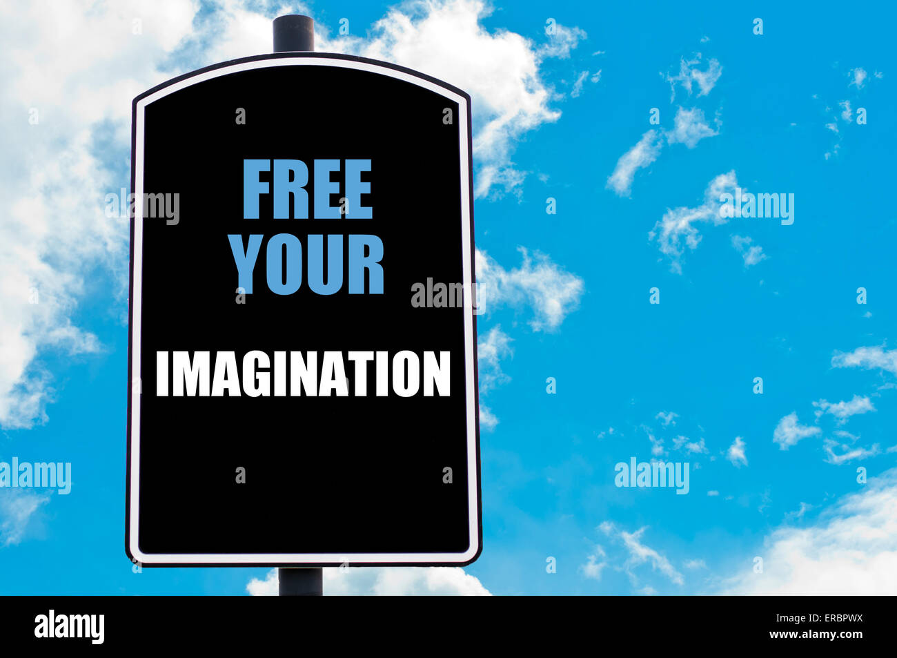 FREE YOUR IMAGINATION motivational quote written on road sign isolated ...