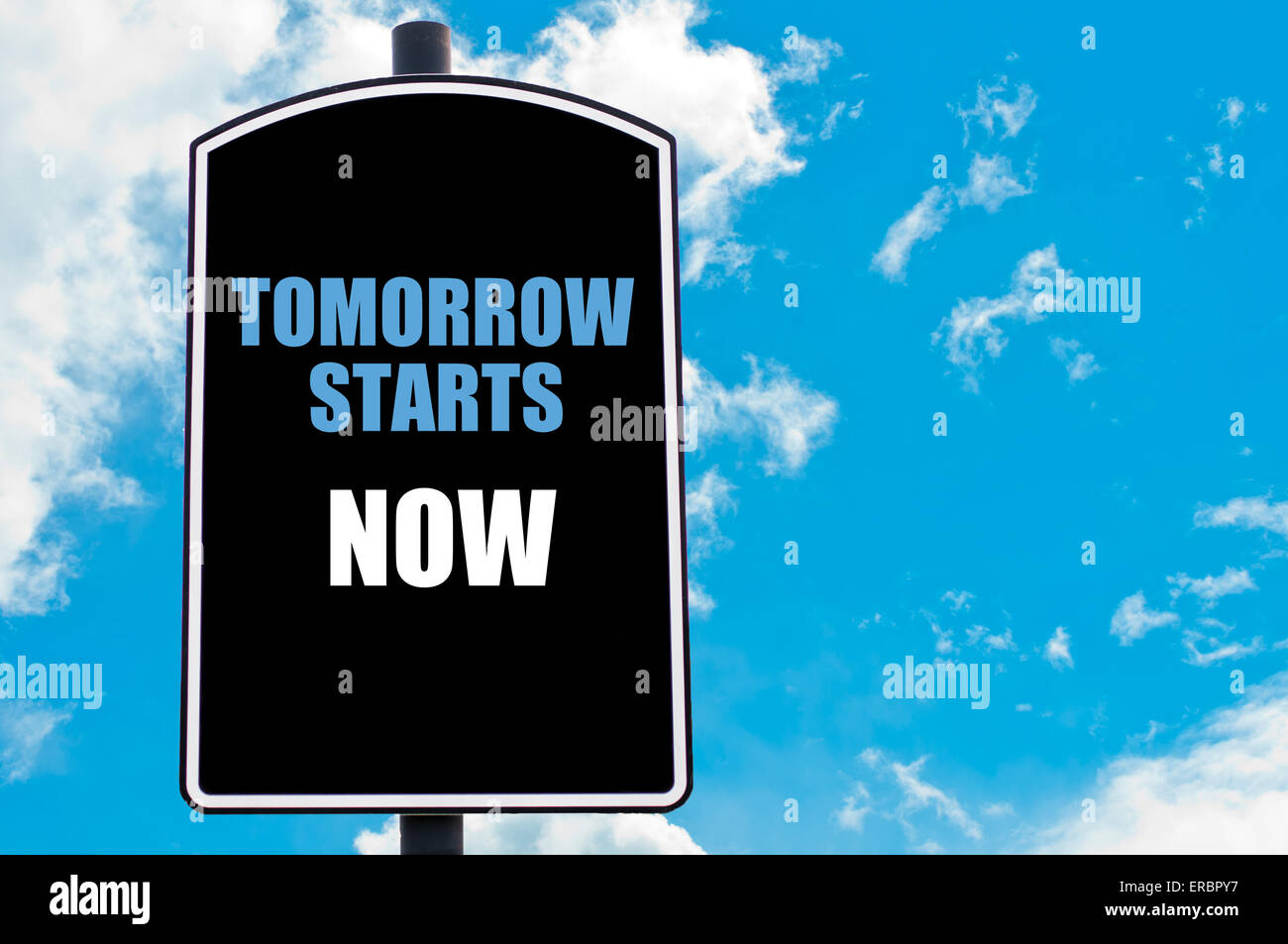 TOMORROW STARTS NOW motivational quote written on road sign isolated ...