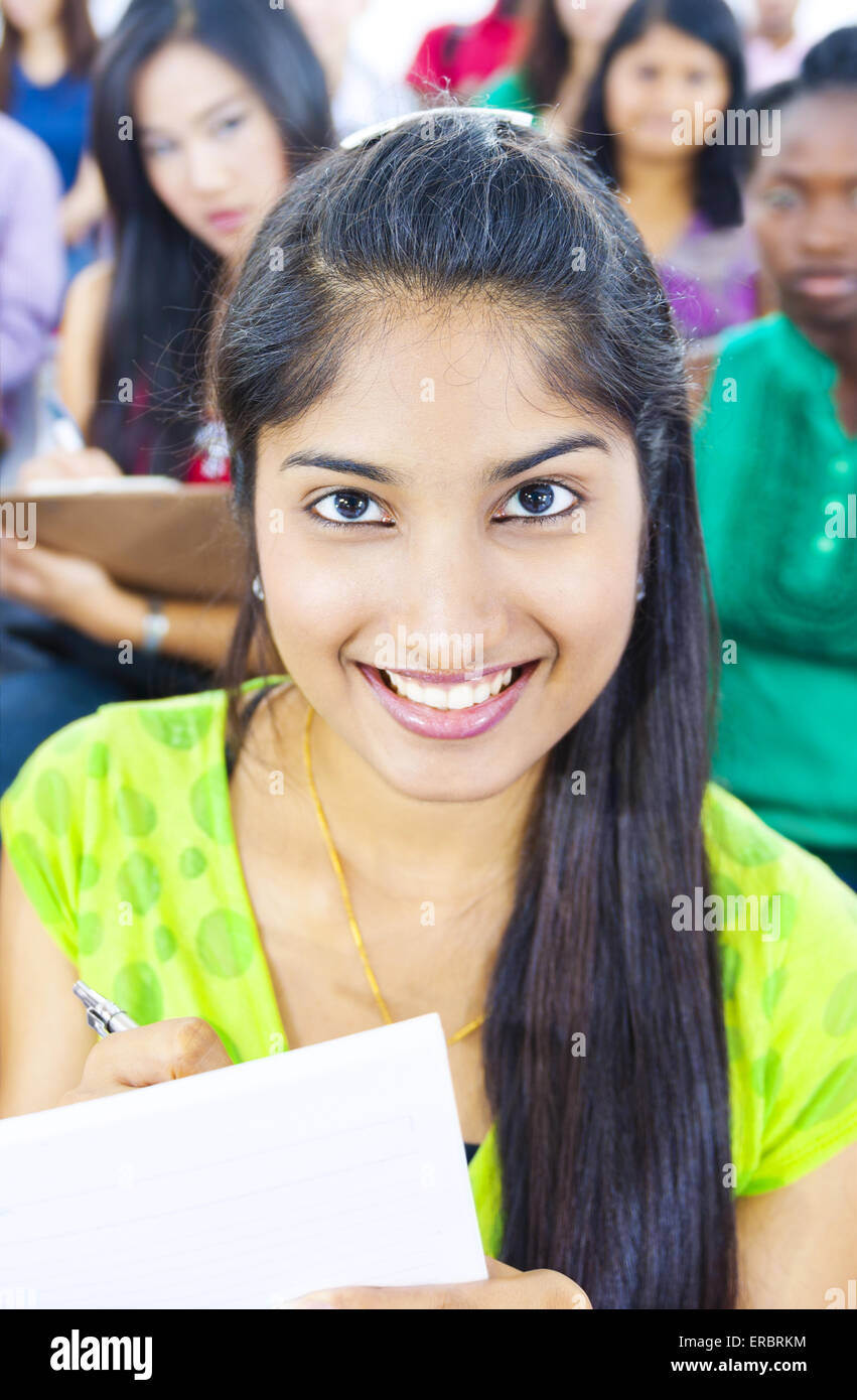Young woman in lecture room Stock Photo - Alamy